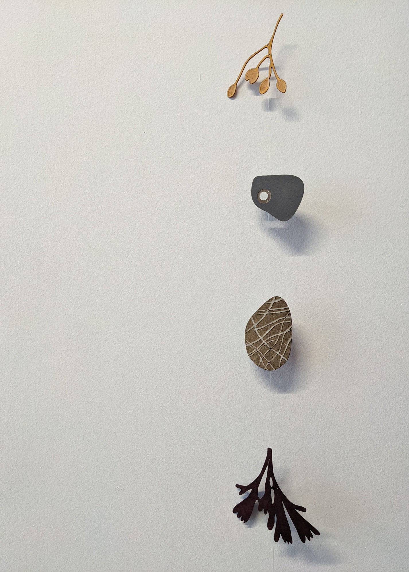 a small collection of paper pebbles & seaweed – Hannah Nunn