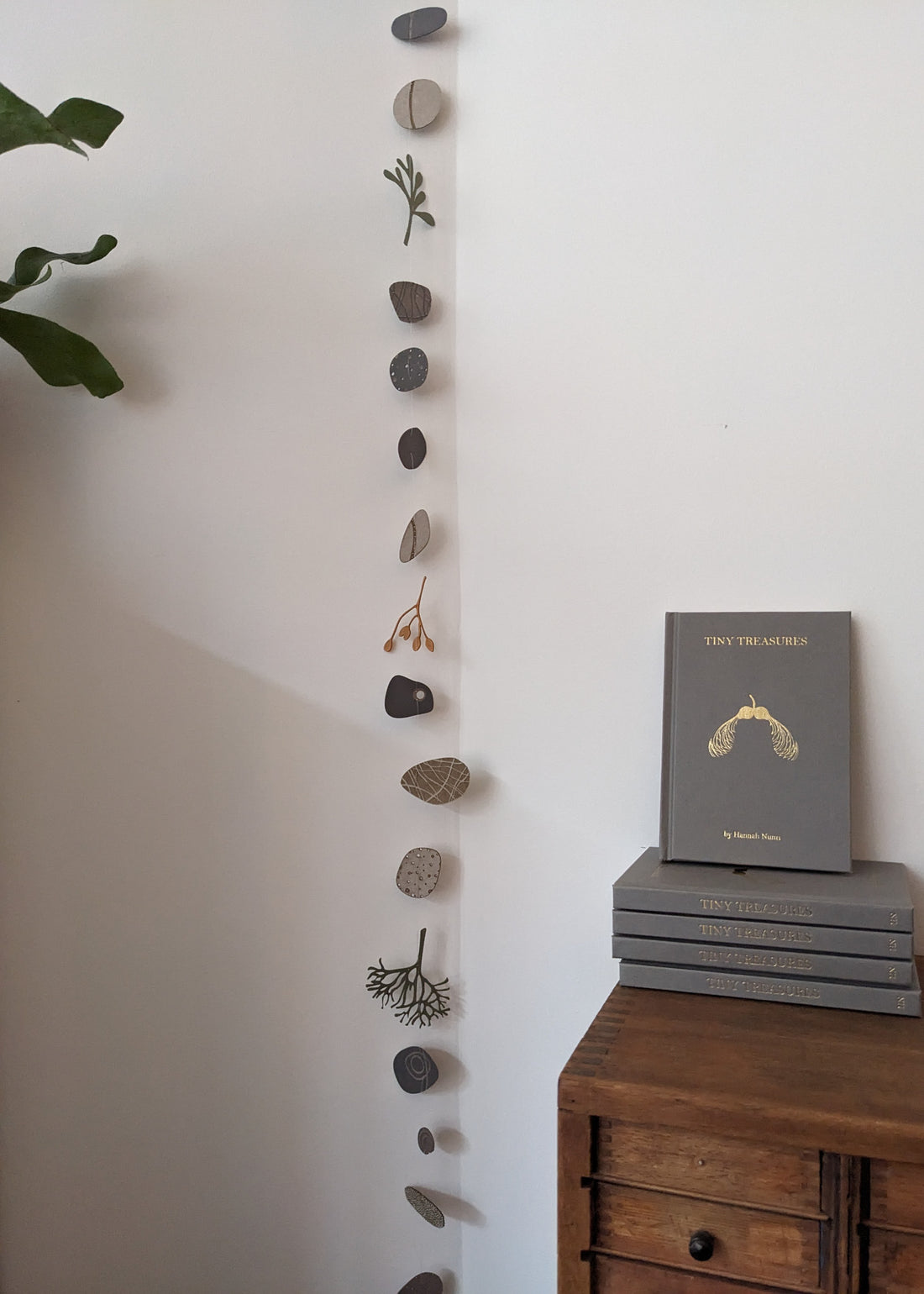 a large collection of paper pebbles & seaweed – Hannah Nunn