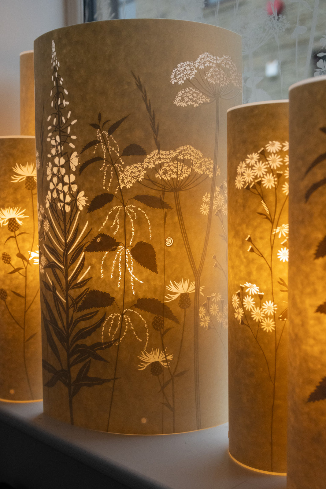 glowing parchment paper feature lamps with cut out nature designs ...