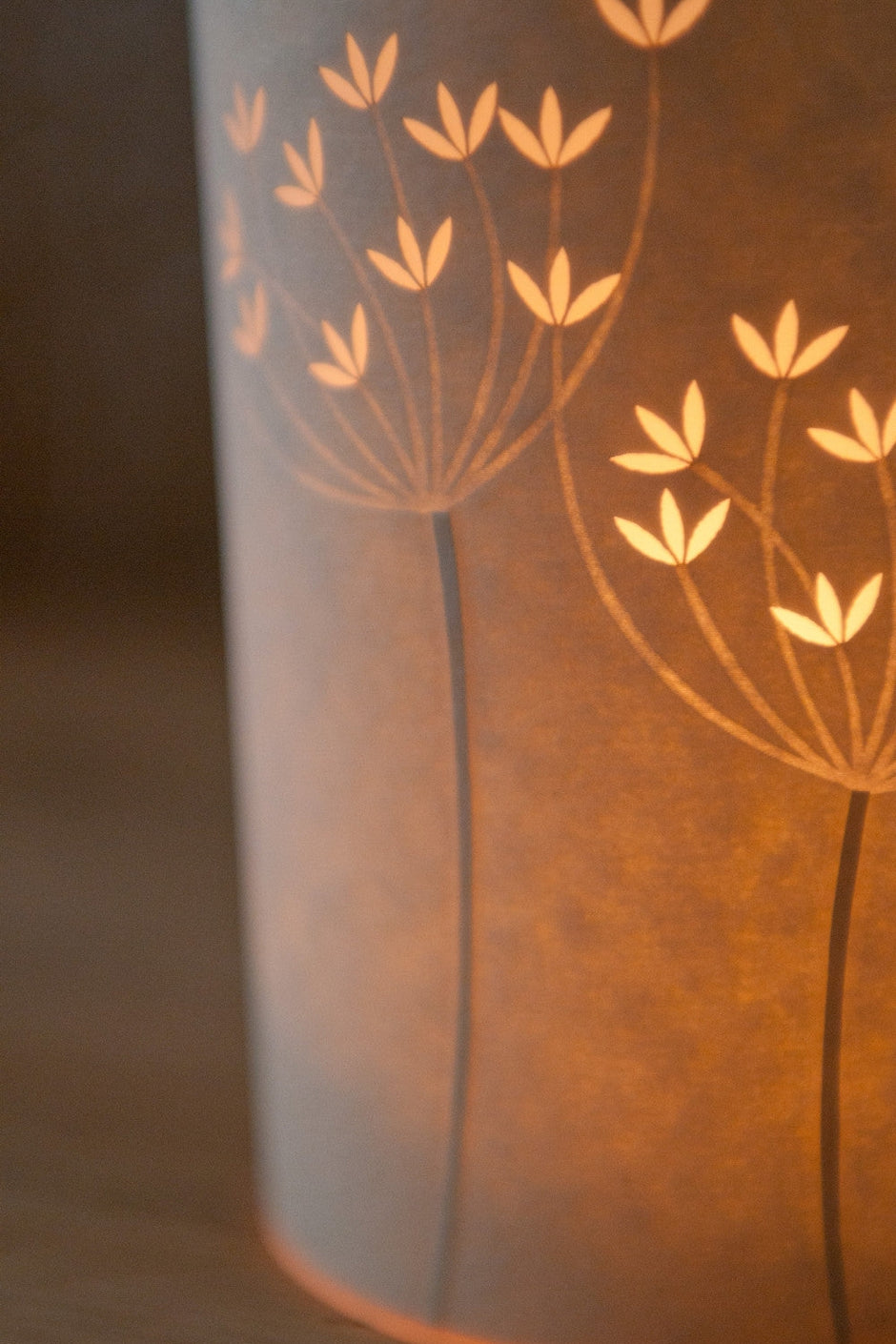 glowing parchment paper candle shades with cut out nature designs by ...