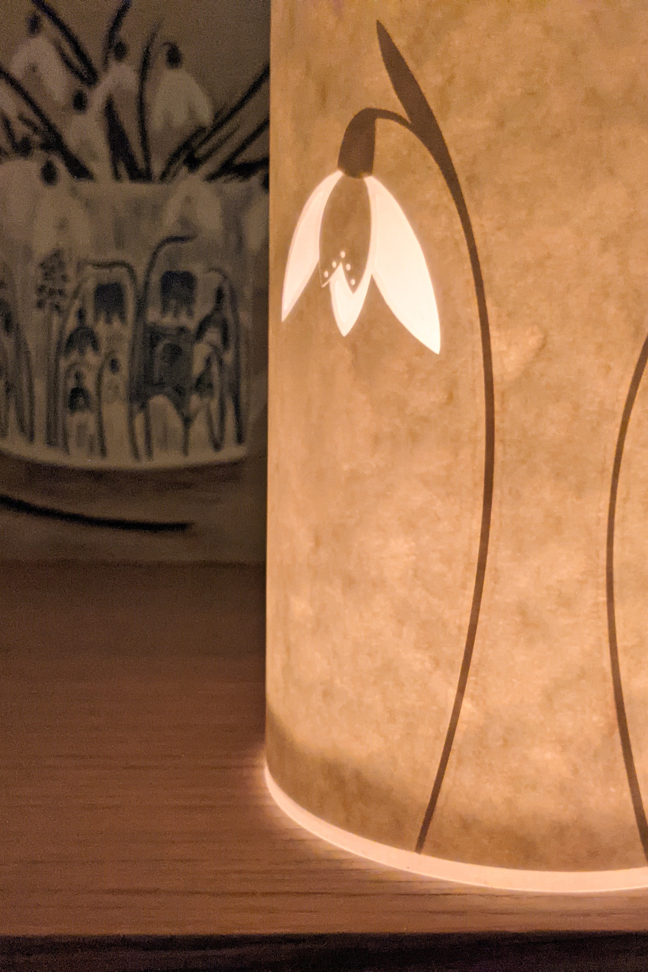 glowing parchment paper candle shades with cut out nature designs by ...