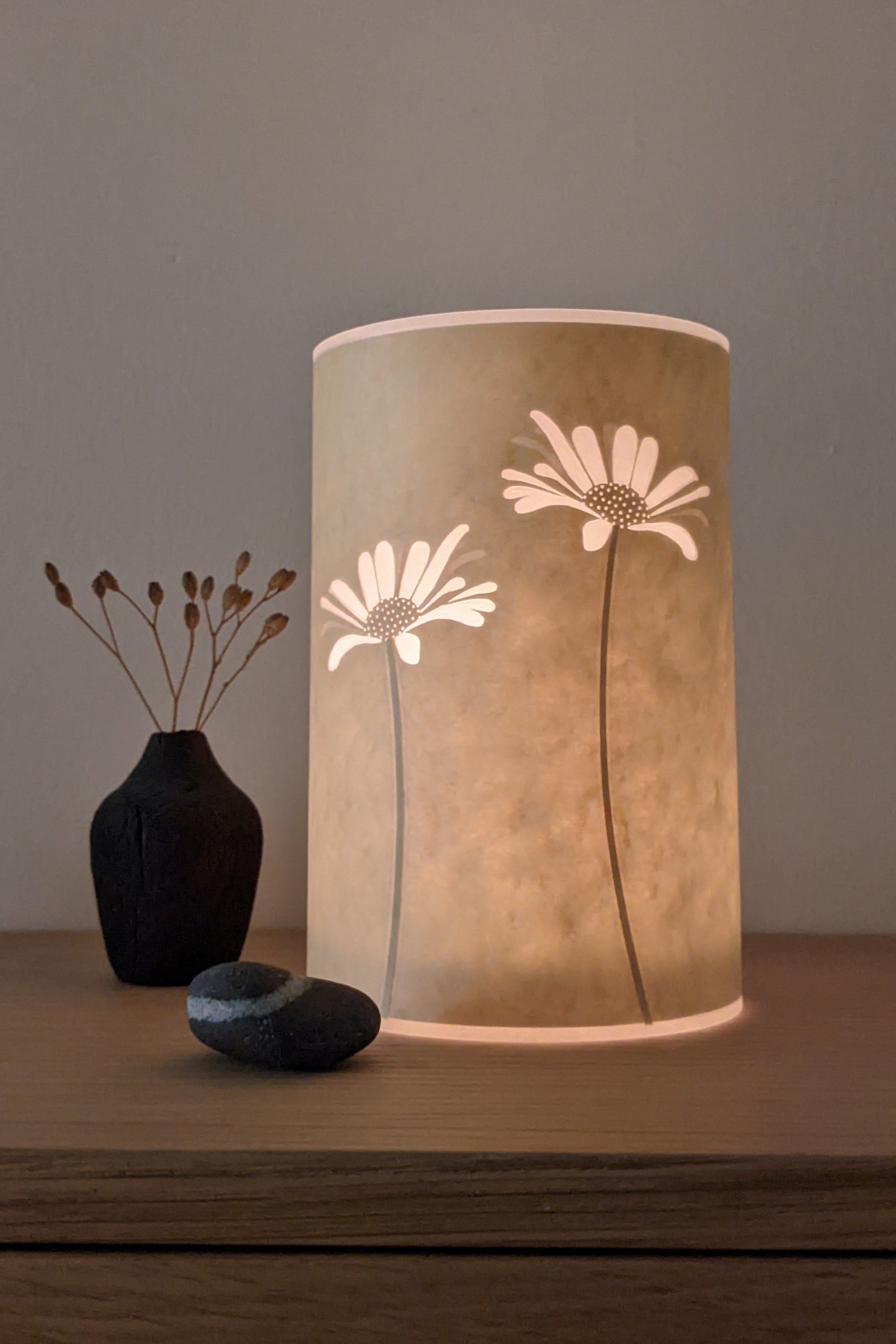 glowing parchment paper candle shades with cut out nature designs by ...
