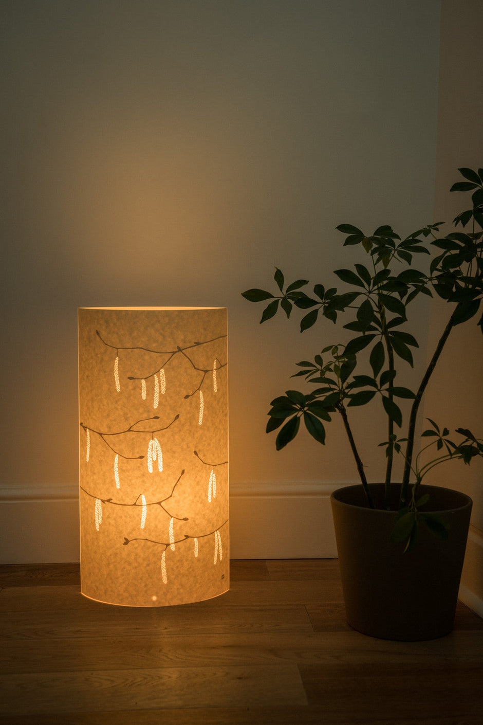 glowing parchment paper feature lamps with cut out nature designs ...
