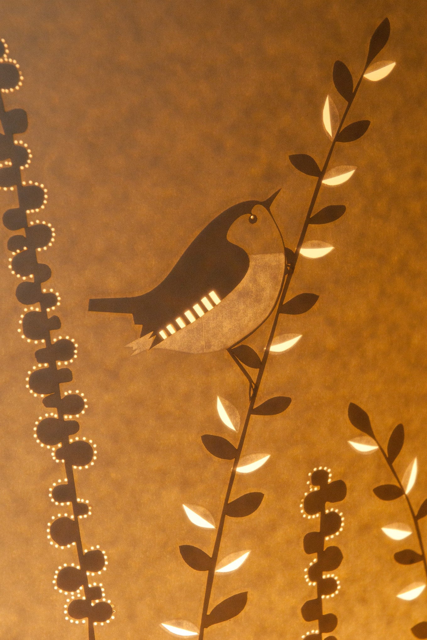 glowing parchment paper feature lamps with cut out nature designs ...