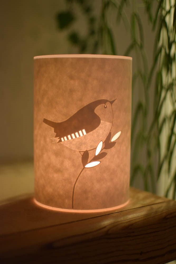 glowing parchment paper candle shades with cut out nature designs by ...