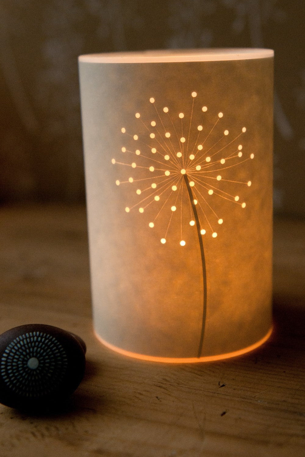 glowing parchment paper candle shades with cut out nature designs by ...