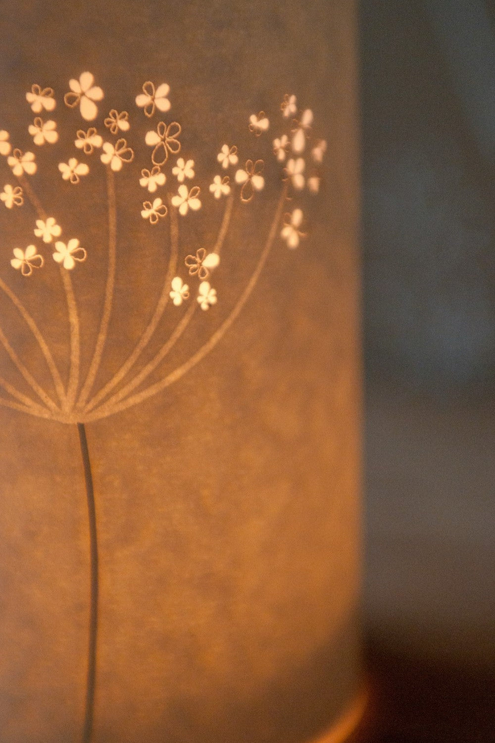 glowing parchment paper candle shades with cut out nature designs by ...